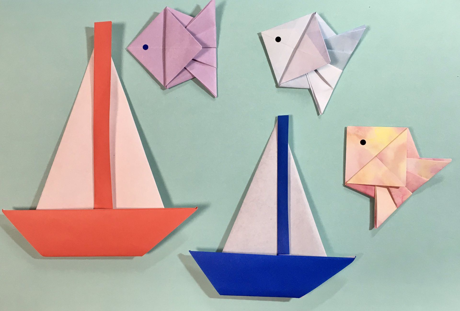 Origami sailboats and fishes in Japan