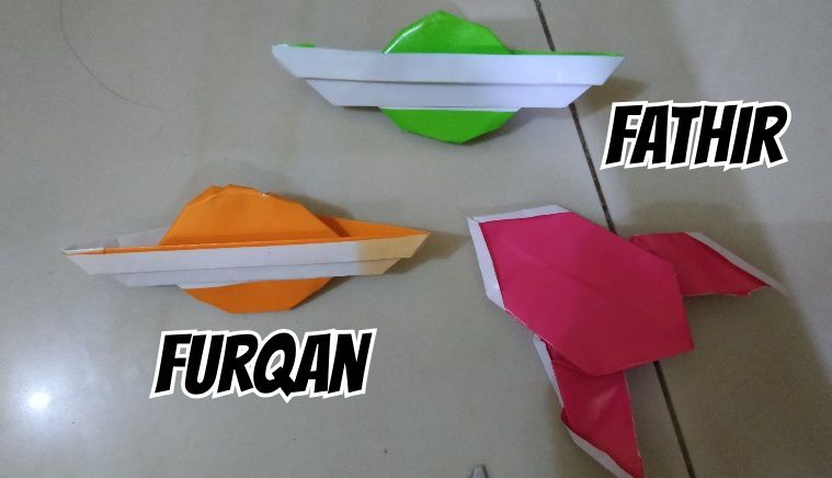 Origami planets and space rocket by Fathir and Furqan